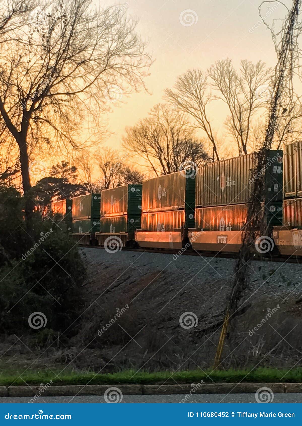The Train Riding into the Sunset T Stock Photo - Image of sunset ...