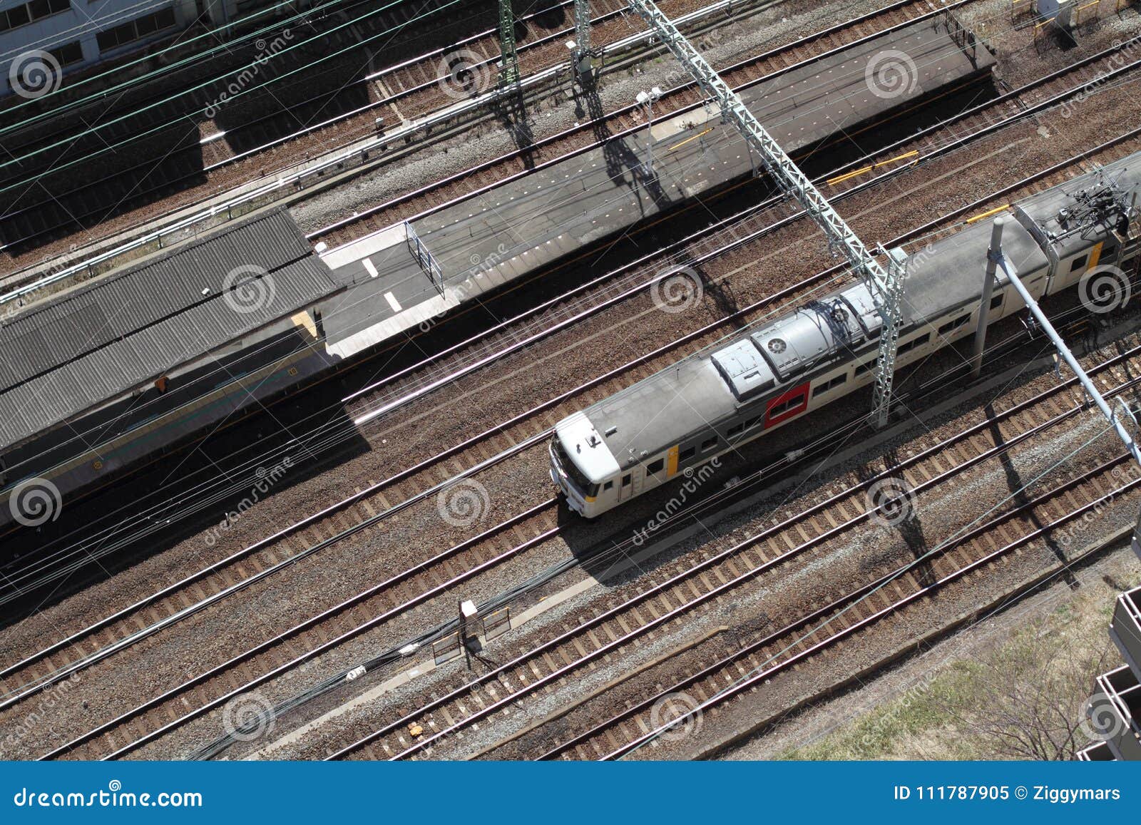 Train Running through Station Stock Image - Image of building, aerial ...