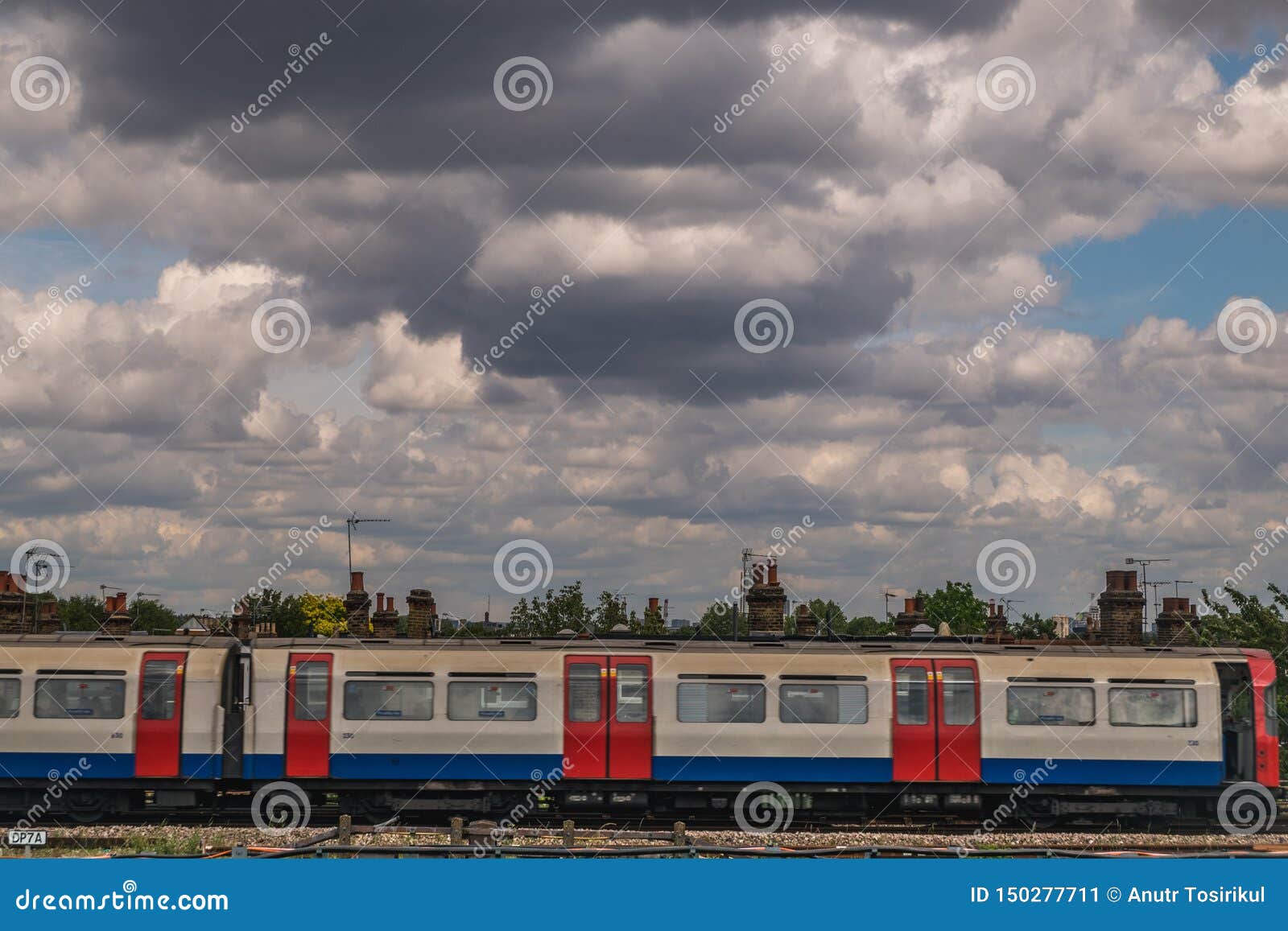 Train Running on the Train Track with a Backdrop of Beautiful Sky and ...