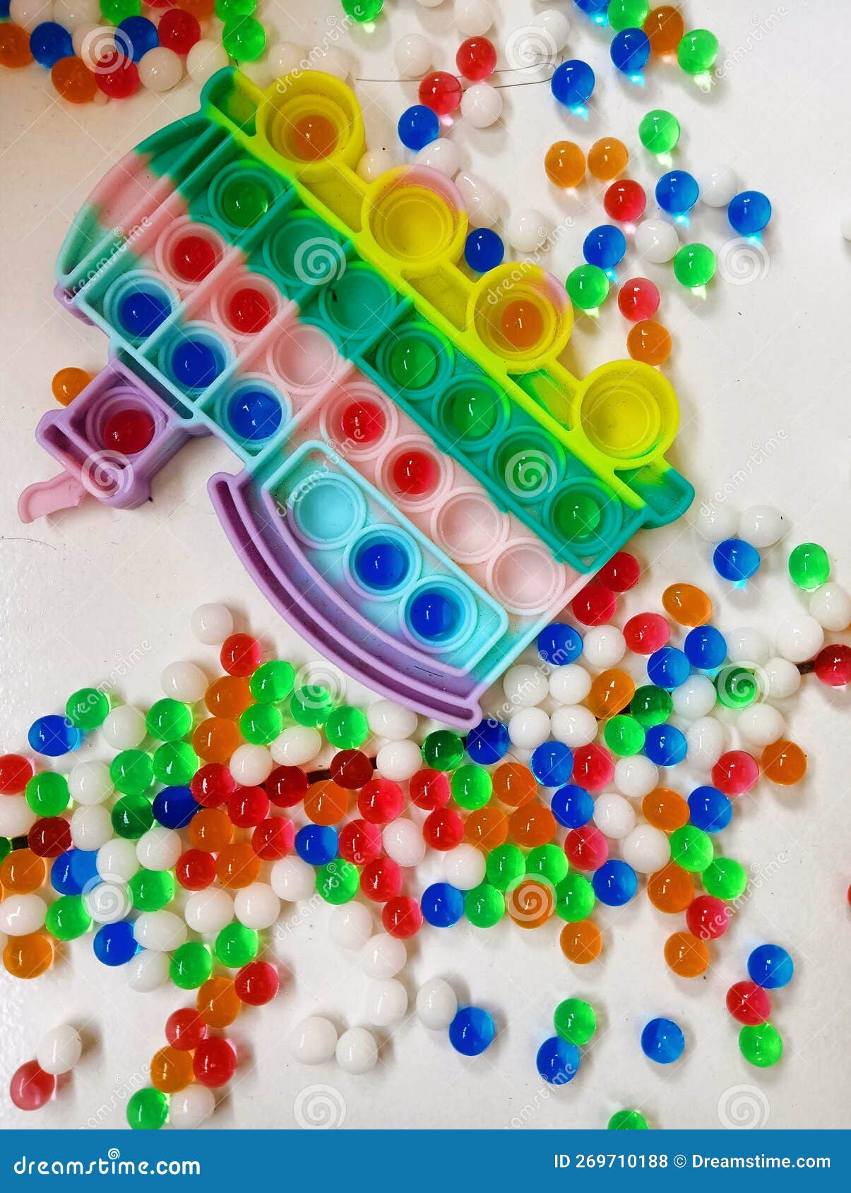 Train-shaped Pop-its in between Colorful Water Gell Balls Stock Photo ...