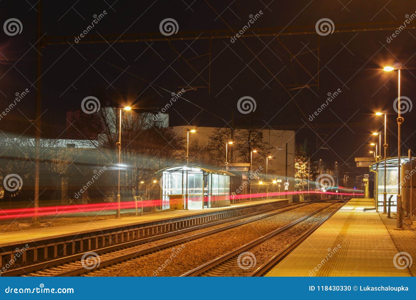 Train Shoot from Back with Red Light on Long Exposure in Station Stock ...