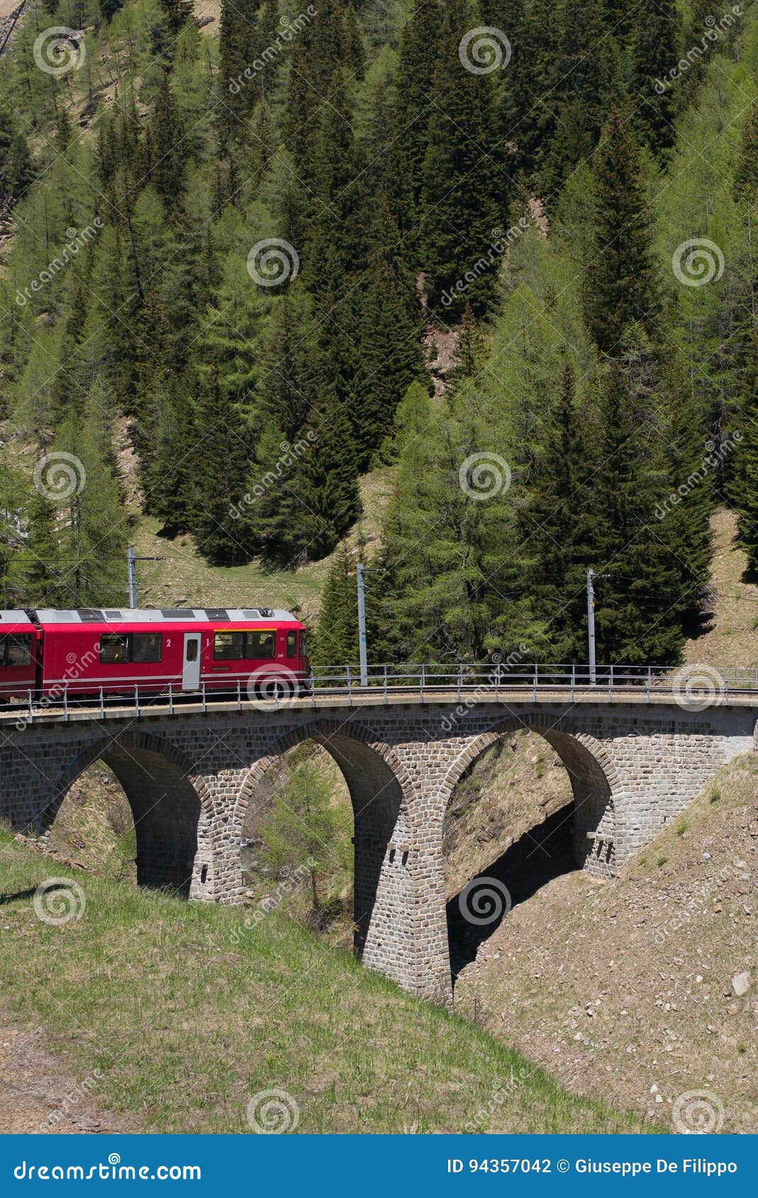 Train on a Small Viaduct Bridge on the Swiss Alps - 1 Stock Photo ...