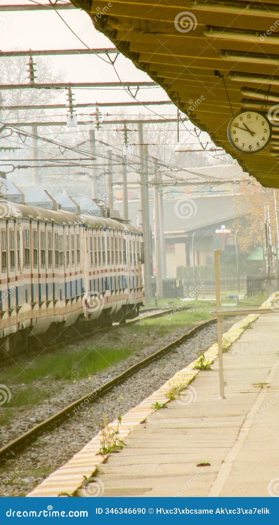Train Station Platform with an Old Train , Clock, Symbolizing Time and ...