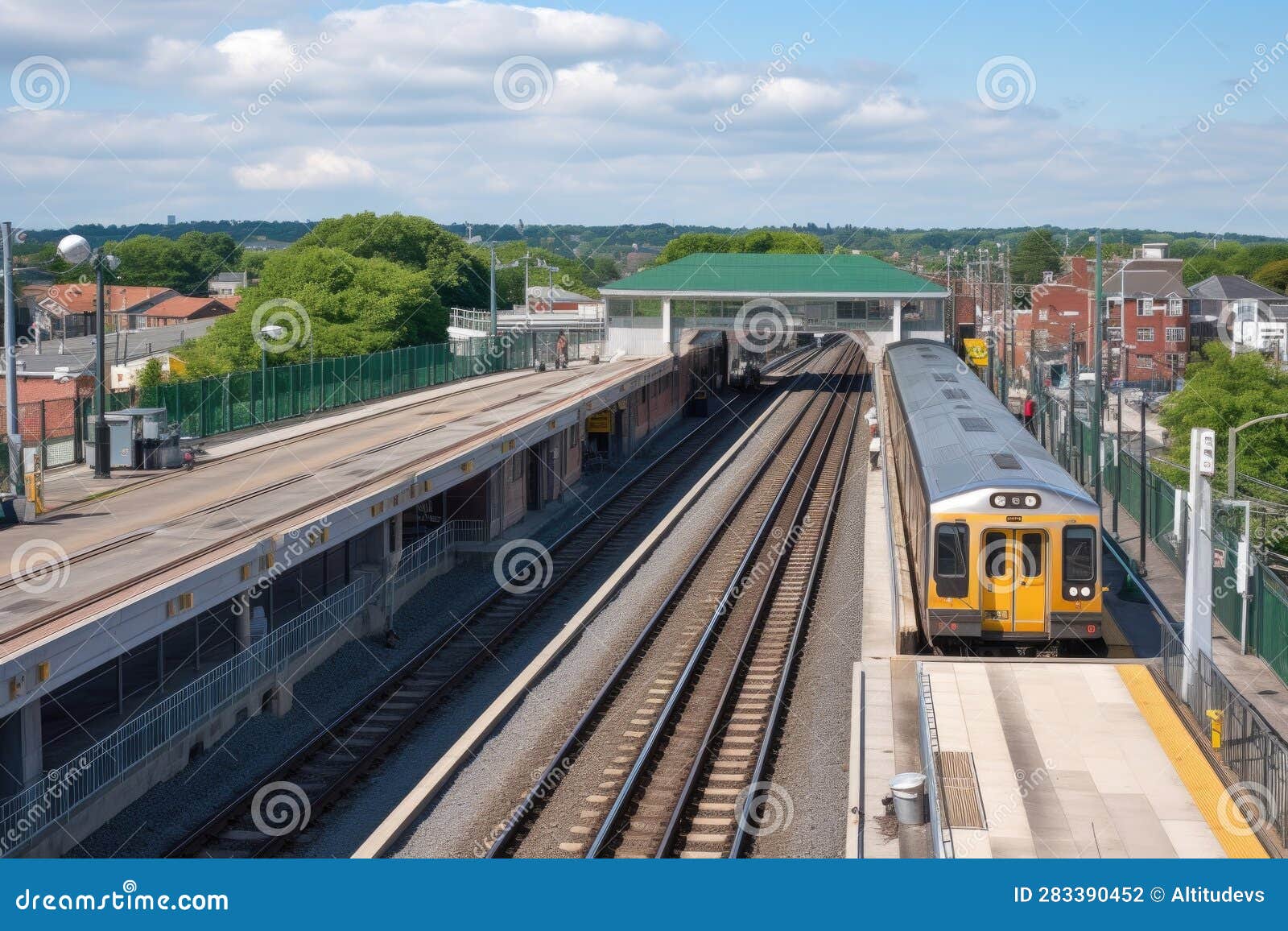 Train Station Platform, with View of Train Approaching, and Passengers ...