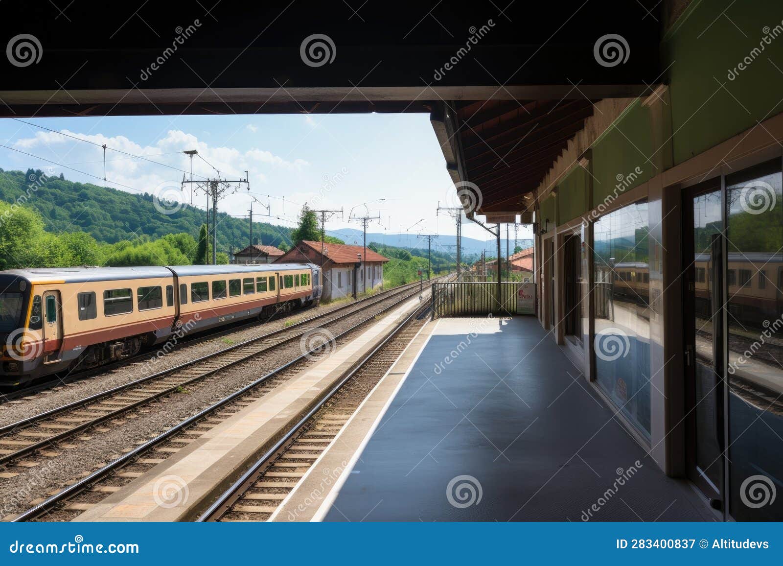 Train Station Platform, with View of the Train in Motion, and a Glimpse ...