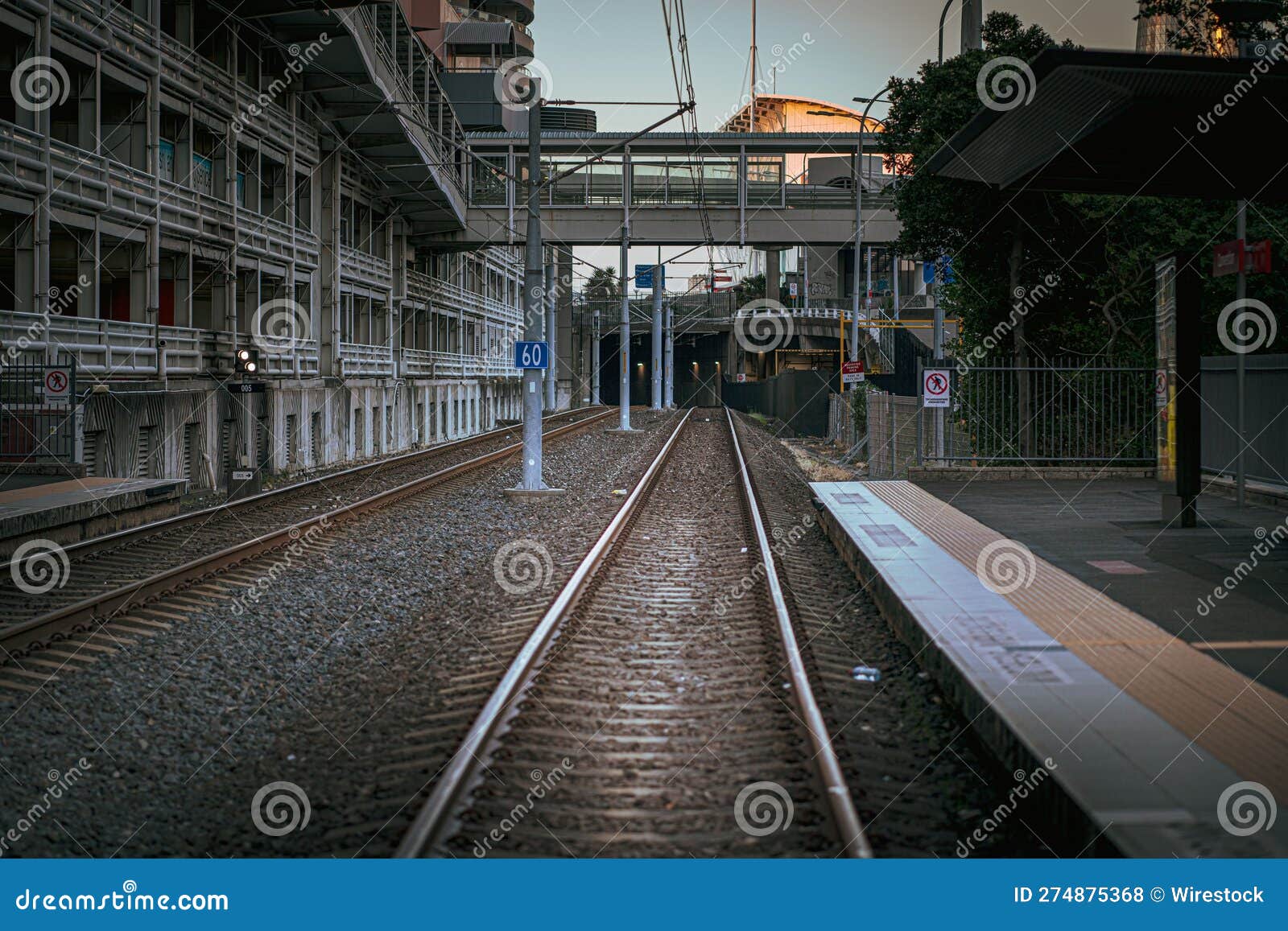 Train Station with Railway Tracks Leading into the Station Stock Photo ...