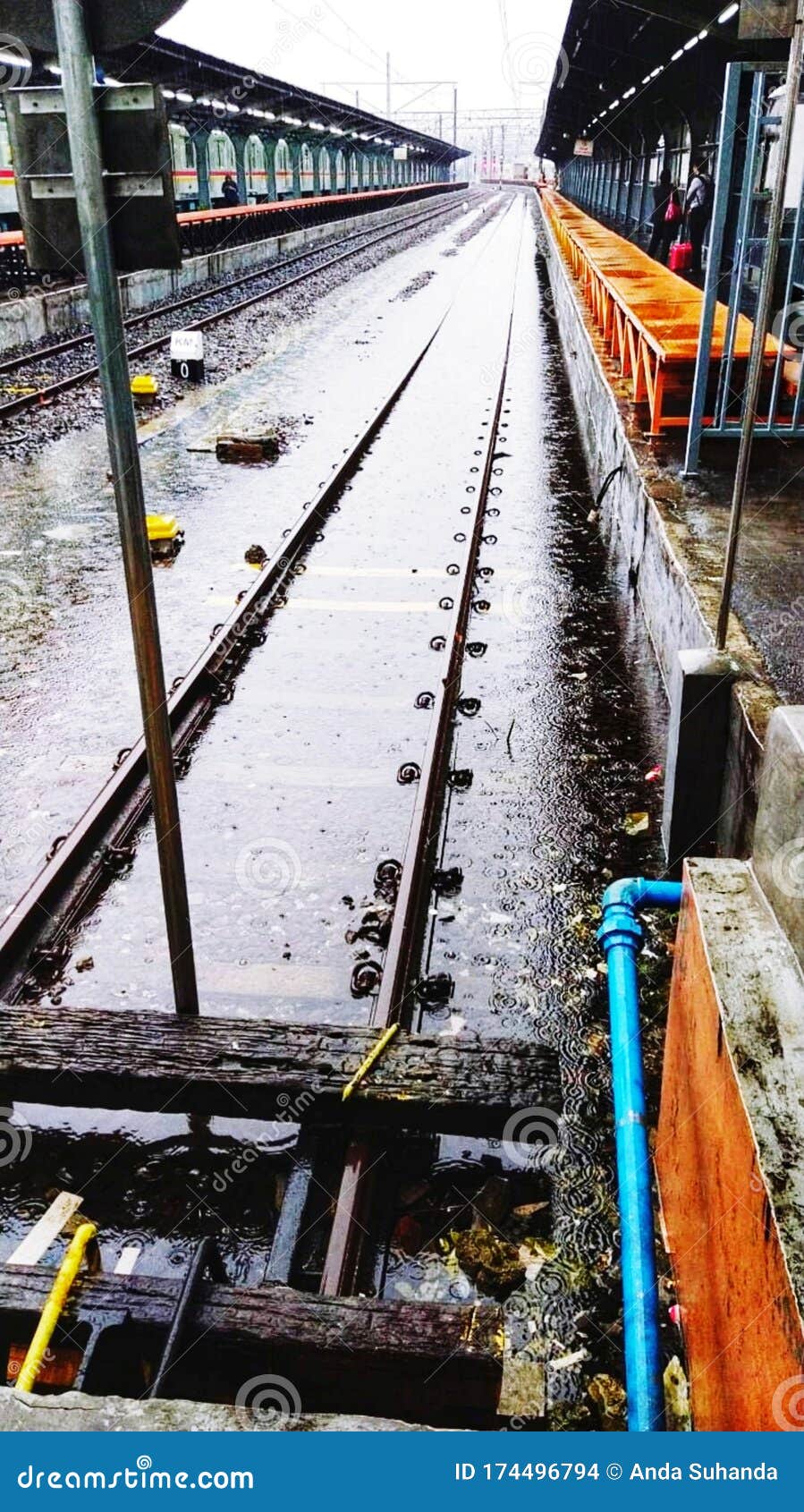 The Train Station when it Rains and Water Pours on Its Tracks Stock ...