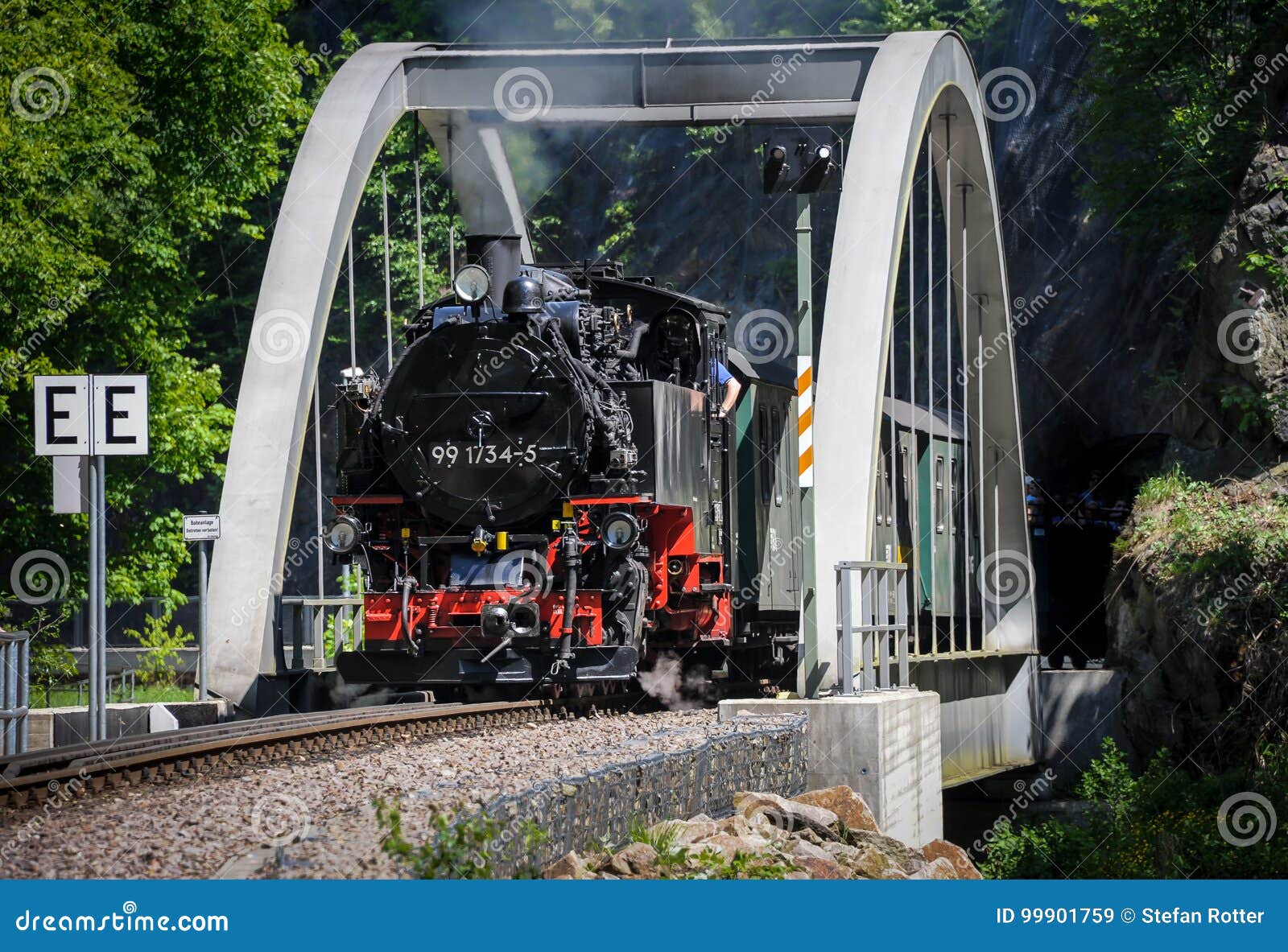 Train with a Steam Engine Going Over a Bridge Stock Image - Image of ...