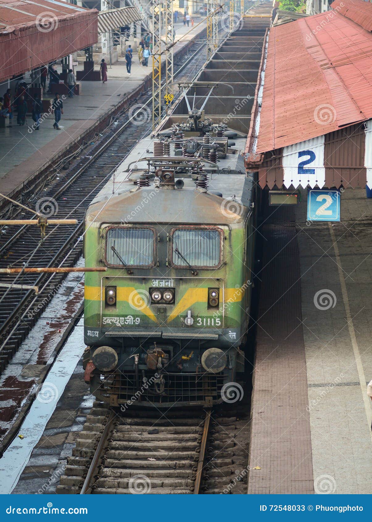 A Train Stopping at the Platform in Delhi, India Editorial Stock Photo ...