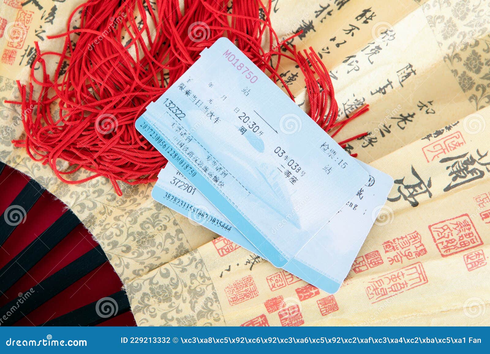 Train Ticket and Tassel on Traditional Chinese Fan Stock Photo - Image ...
