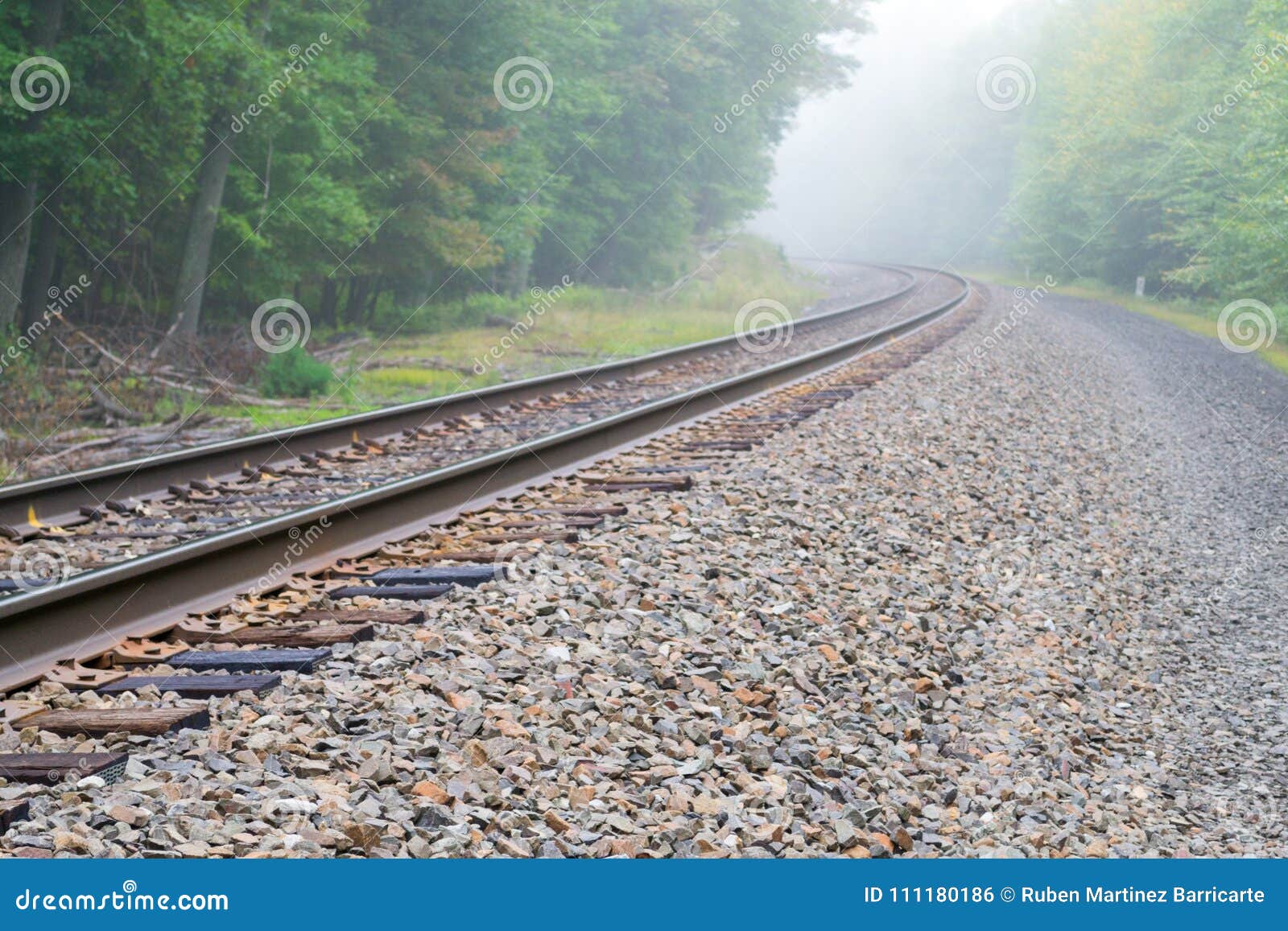 Train track into the fog stock photo. Image of transportation - 111180186