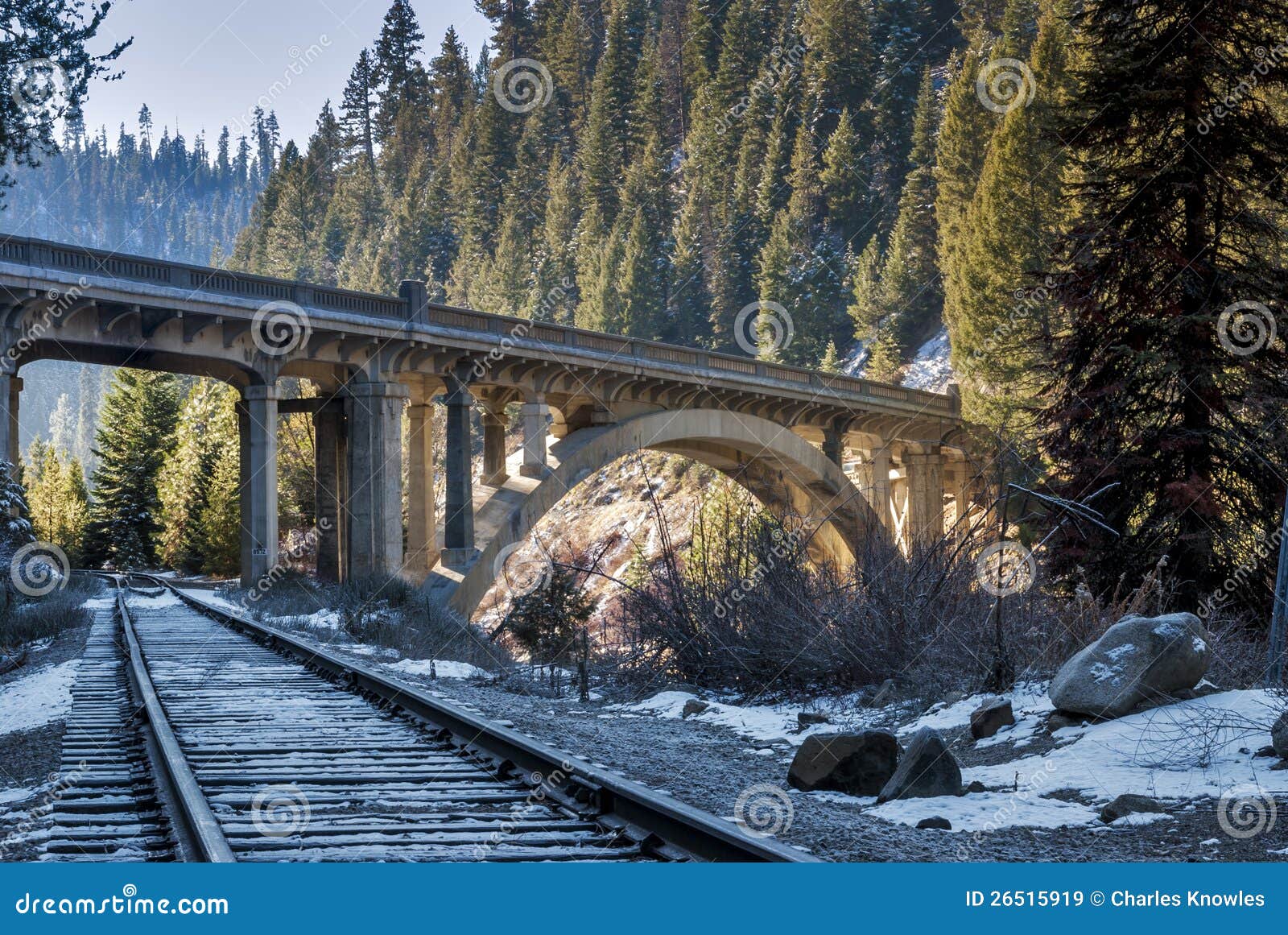 Train Tracks Pass Under a Mountain Bridge Stock Image - Image of ...