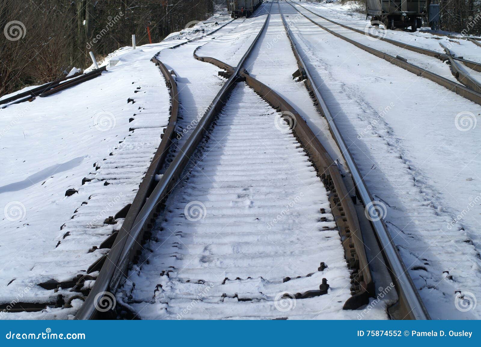 Train tracks in the snow stock photo. Image of railway - 75874552