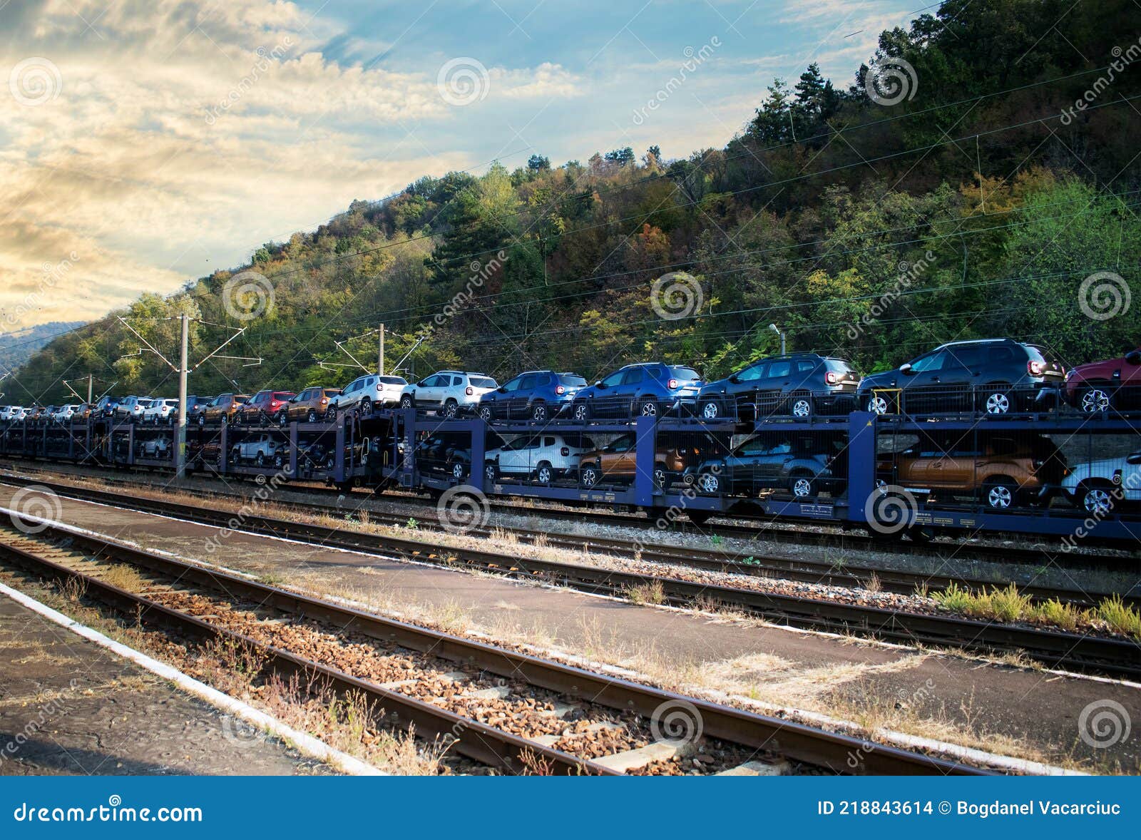 Train Transporting Cars.Autorack with New Cars for Export Editorial ...