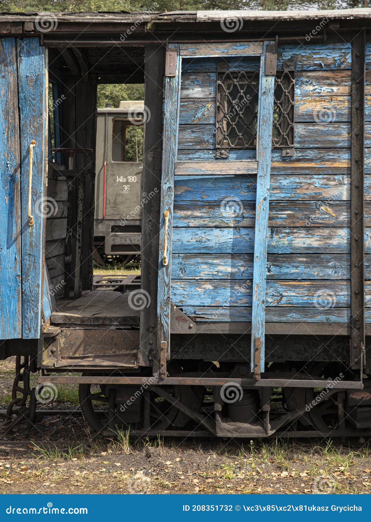 An old and rusty carriage stock photo. Image of locomotive - 208351732