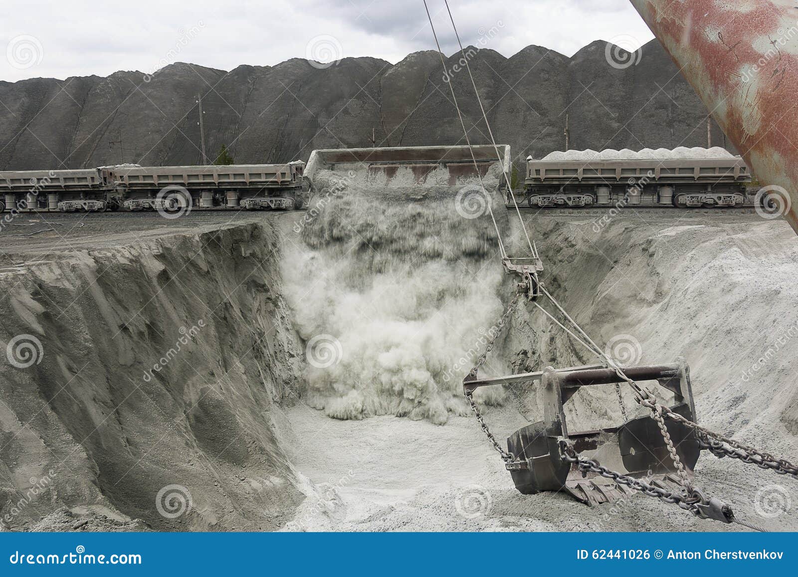 A train unloads ore stock photo. Image of factory, wagons - 62441026