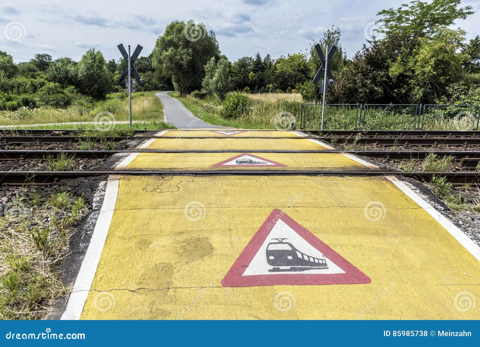 Train Warning Sign at a Railroad Crossing Stock Photo - Image of rails ...