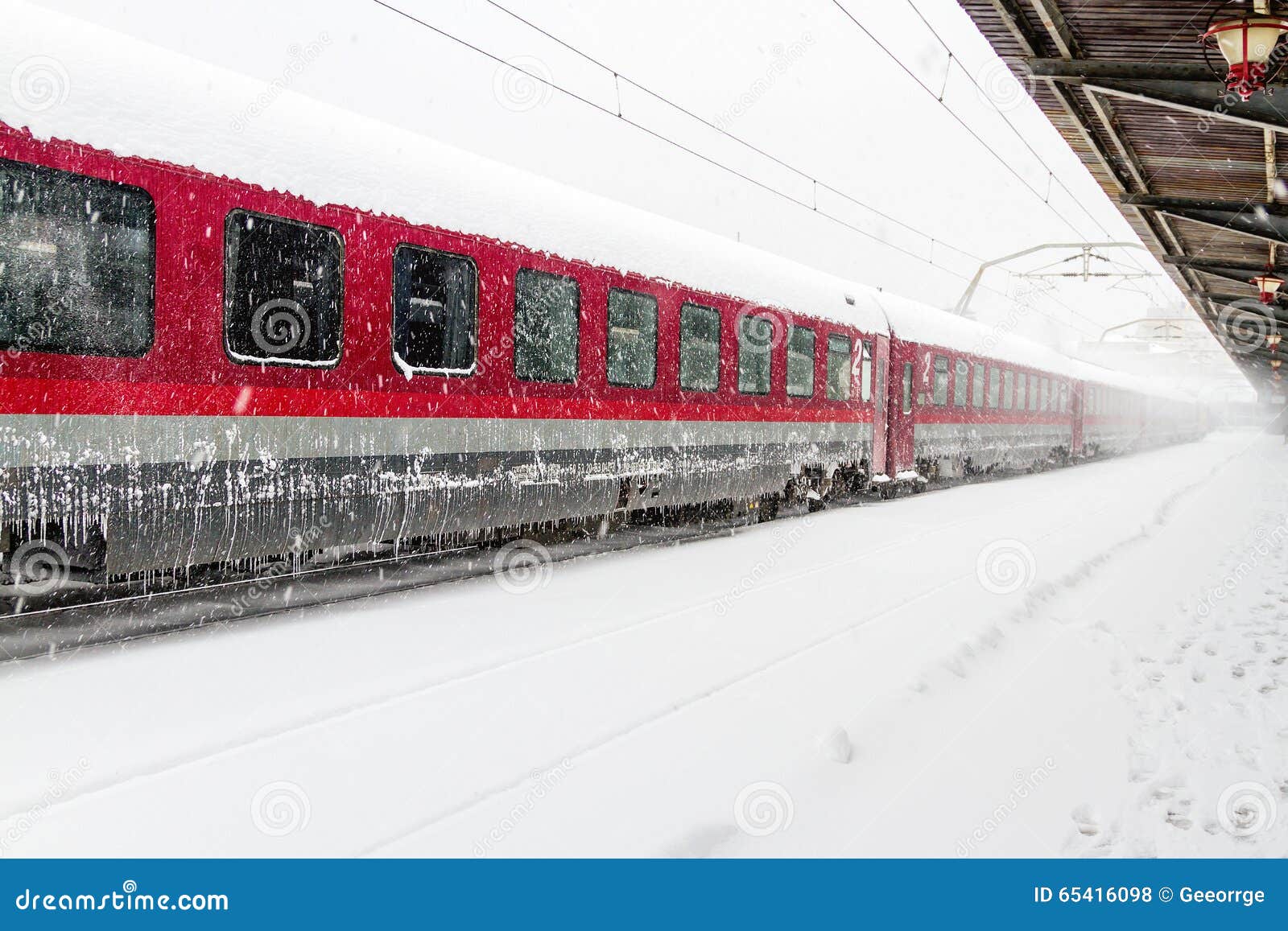 Train Who Arrived during a Snow Storm Stock Photo - Image of public ...