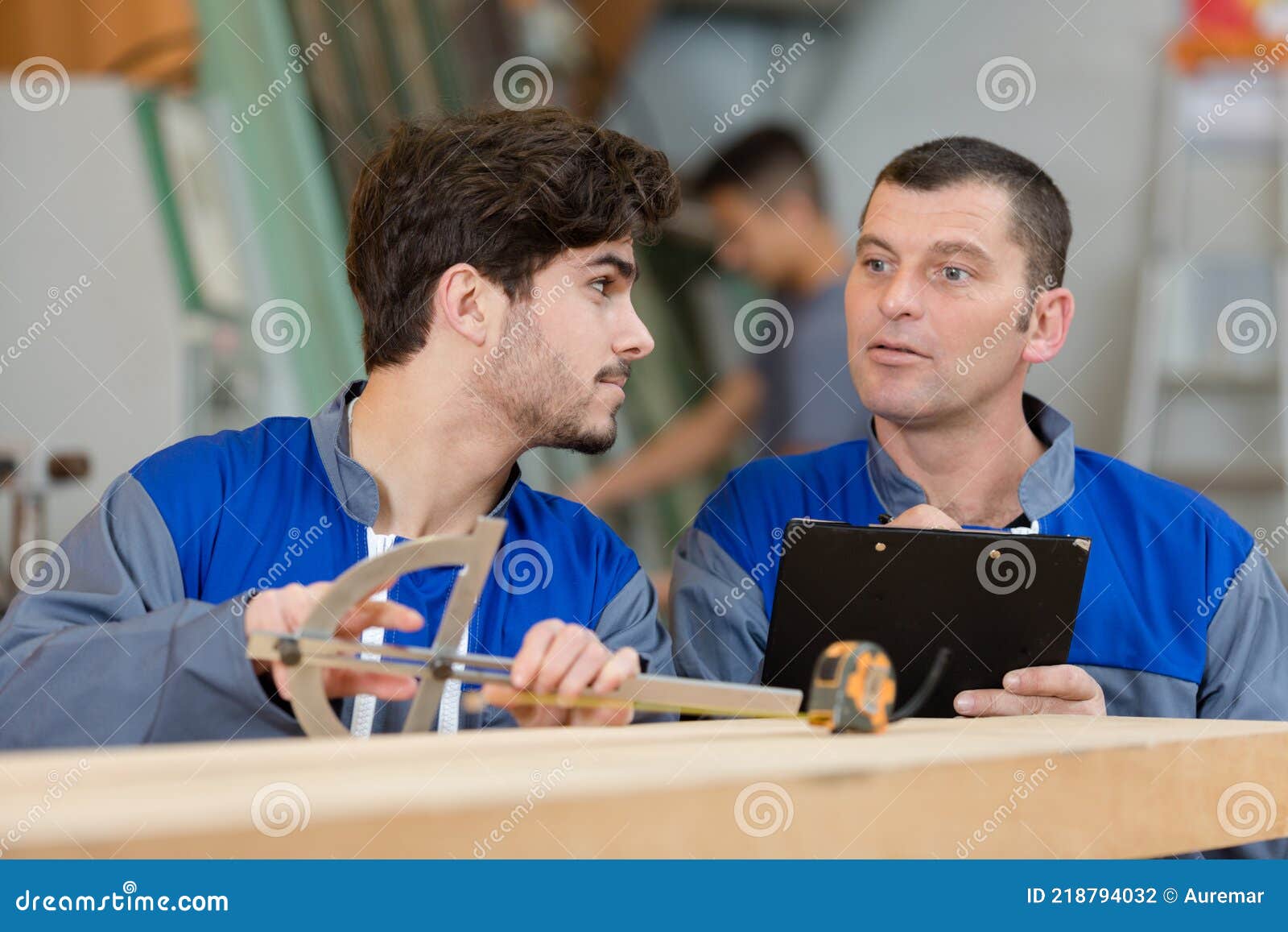 Trainee Carpenter Using Protractor Tool Stock Photo - Image of menonly ...