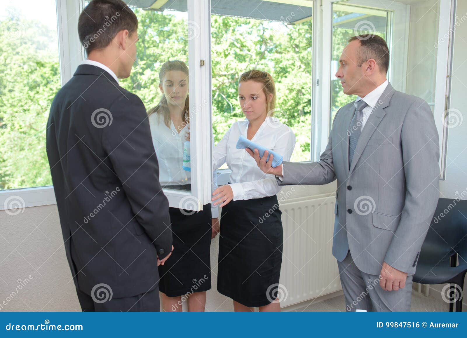 Trainee Cleaning Mirror Under Supervision Stock Photo - Image of ...
