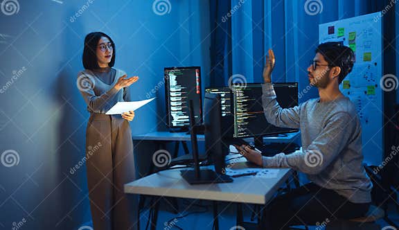 Trainee Developer Hand Up To Ask Speaker about Software Coding Project ...