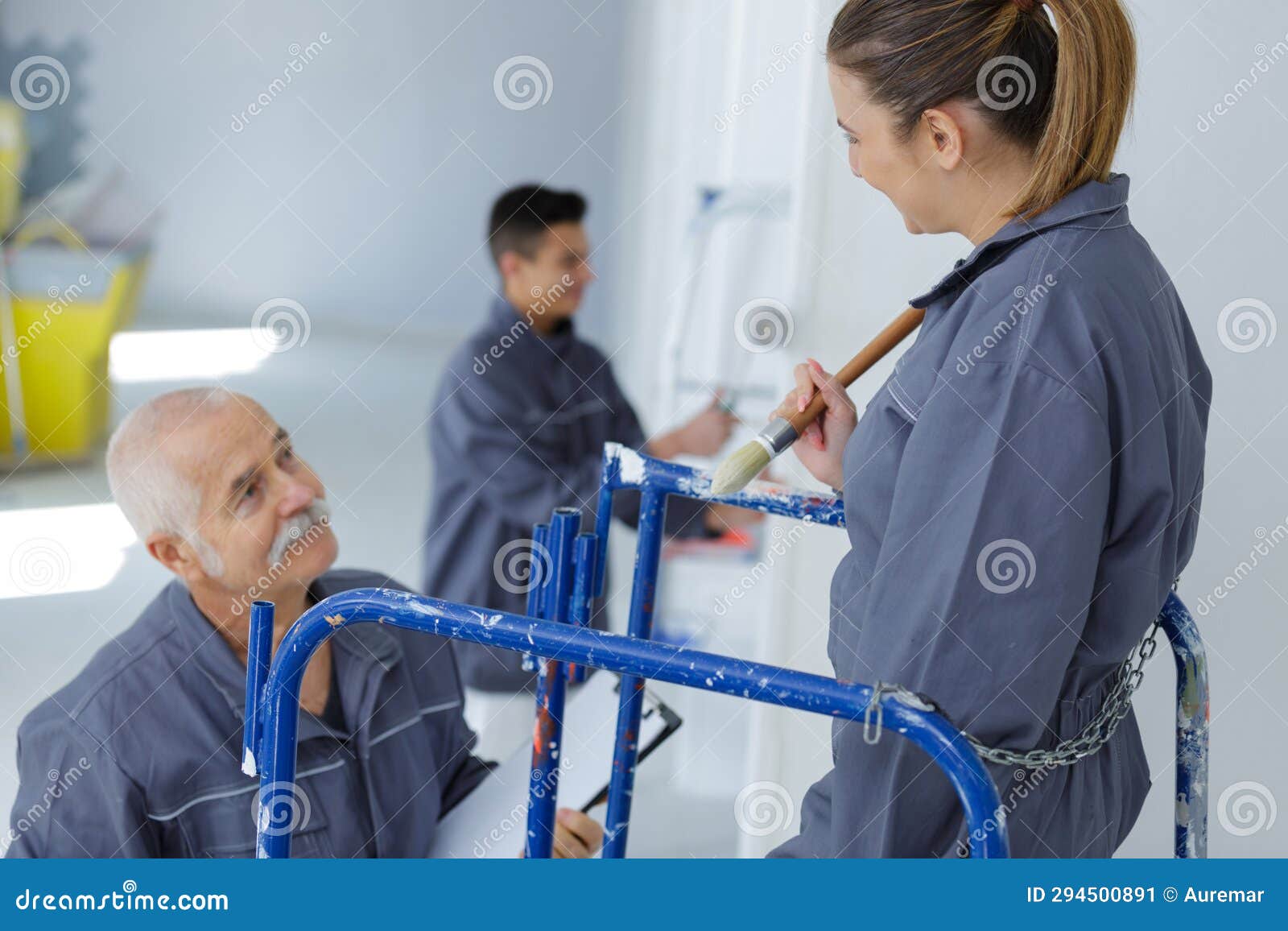 Trainee Female Painter on Scaffolding Platform Stock Image - Image of ...