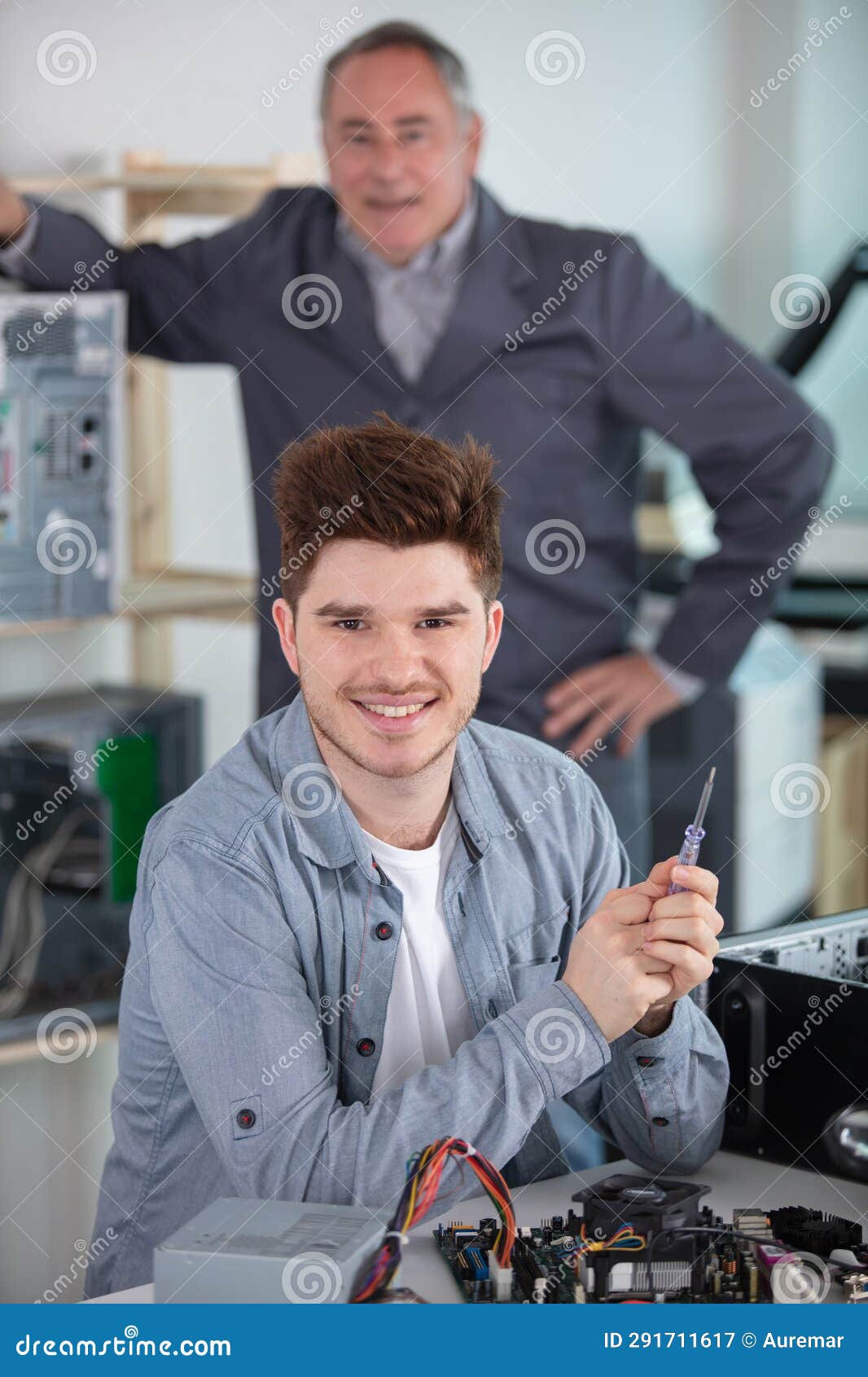 Trainee Technician Learning How To Wire Up Computer Stock Image - Image ...