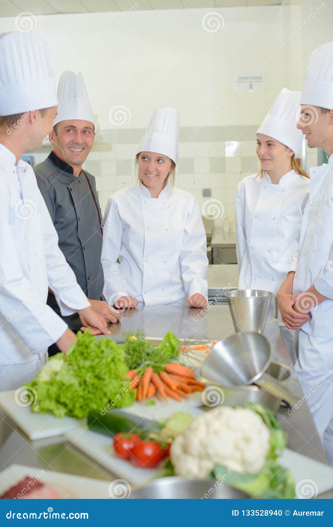 Trainees in Kitchen with Chef Stock Photo - Image of people, food ...