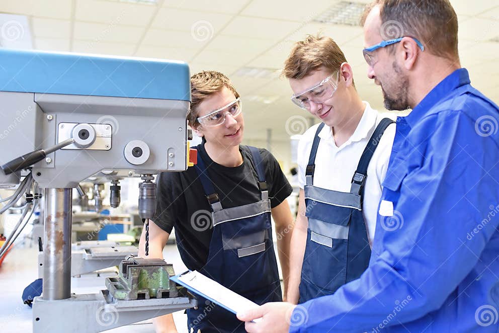 Trainer and Apprentice in Technical Vocational Training at a Drilling ...