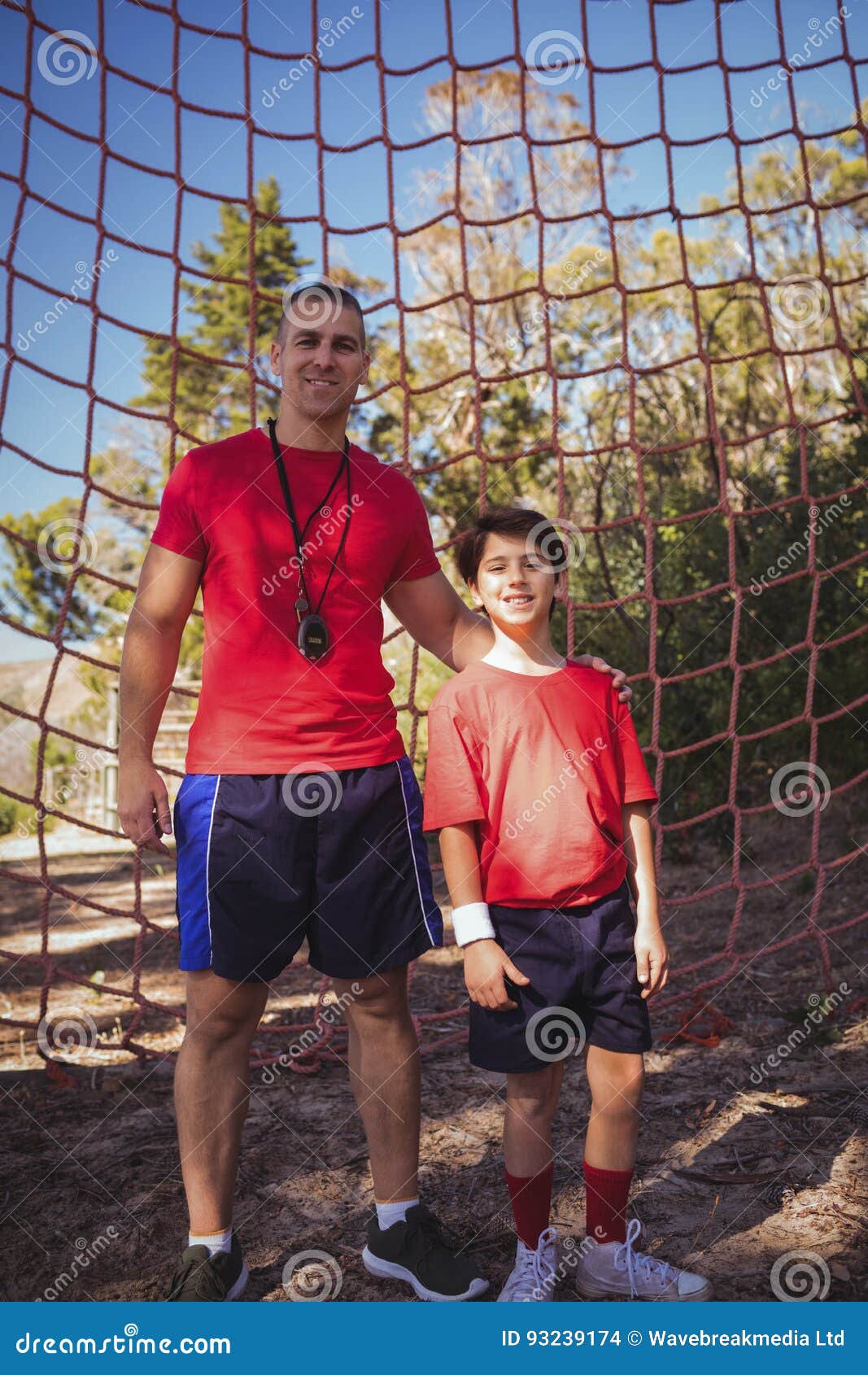 Trainer and Boy Standing Together in the Boot Camp Stock Photo - Image ...