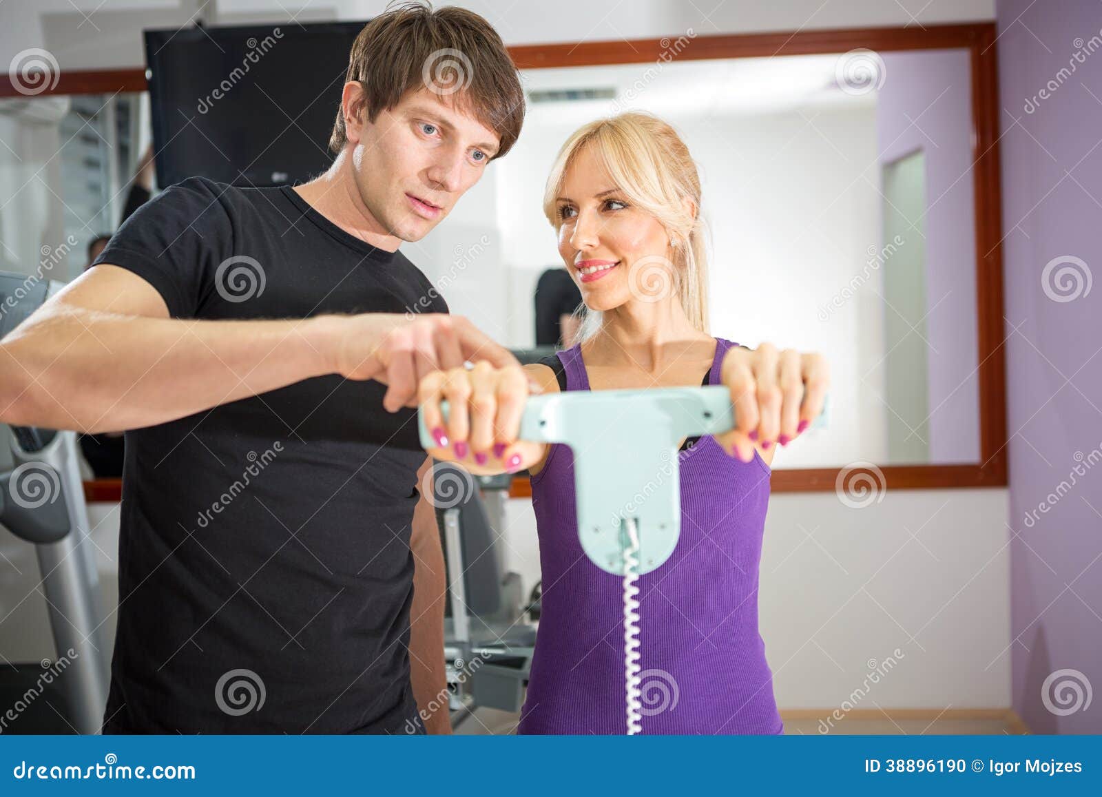 Trainer with Client Checking Result Stock Photo - Image of female ...