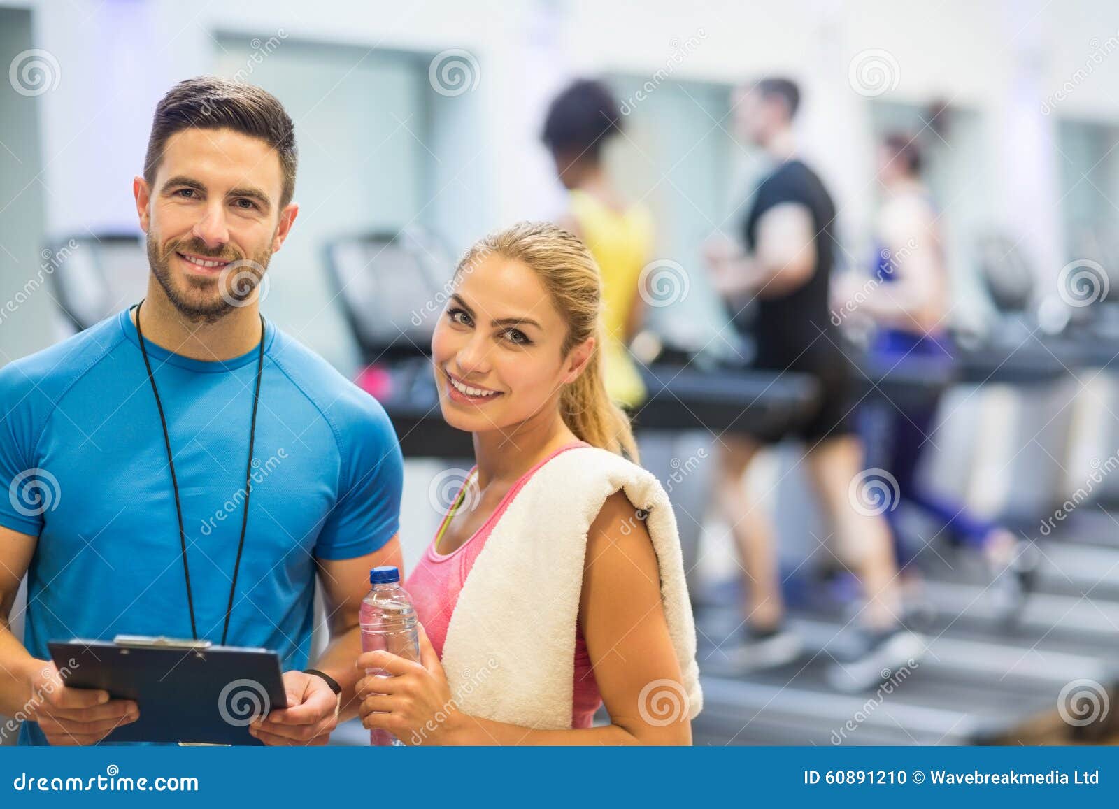 Trainer and Client Discussing Her Progress Stock Photo - Image of ...
