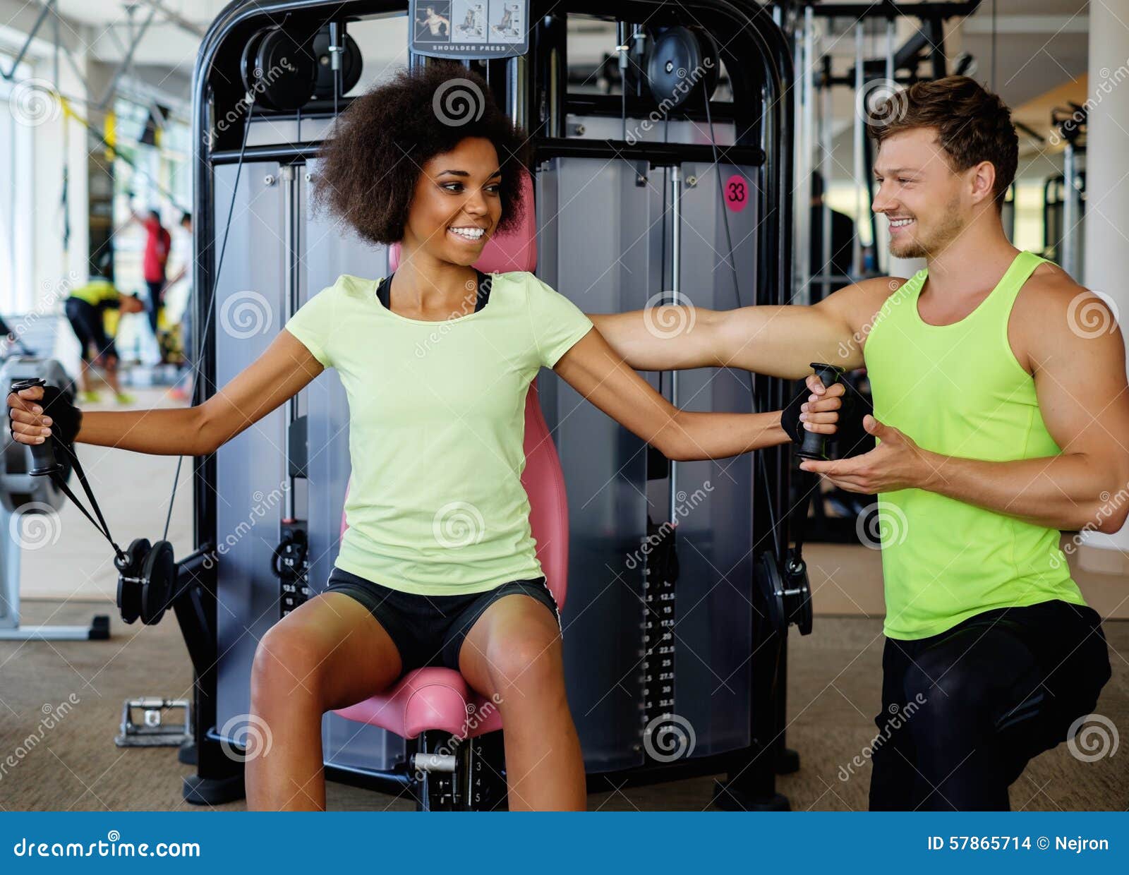 Trainer Explaining How To Use Training Machine Stock Photo - Image of ...