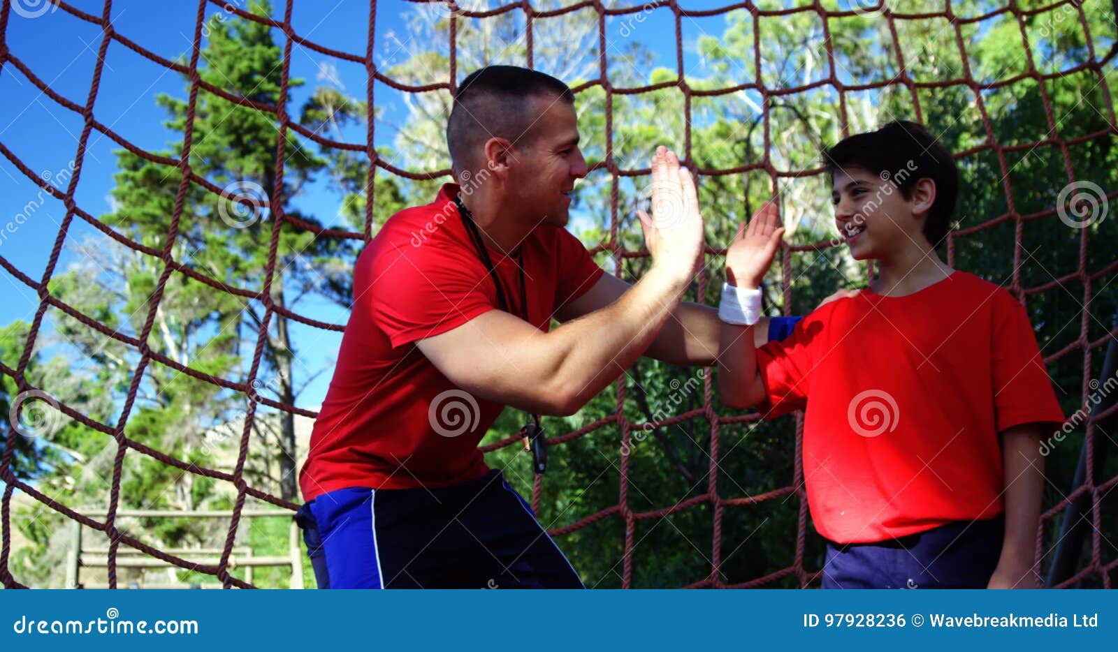 Trainer Giving High Five To Boy in the Boot Camp Stock Footage - Video ...