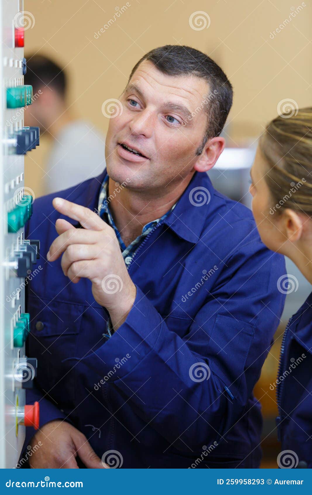 Trainer Having Lessons Next To Panel Buttons Stock Image - Image of ...