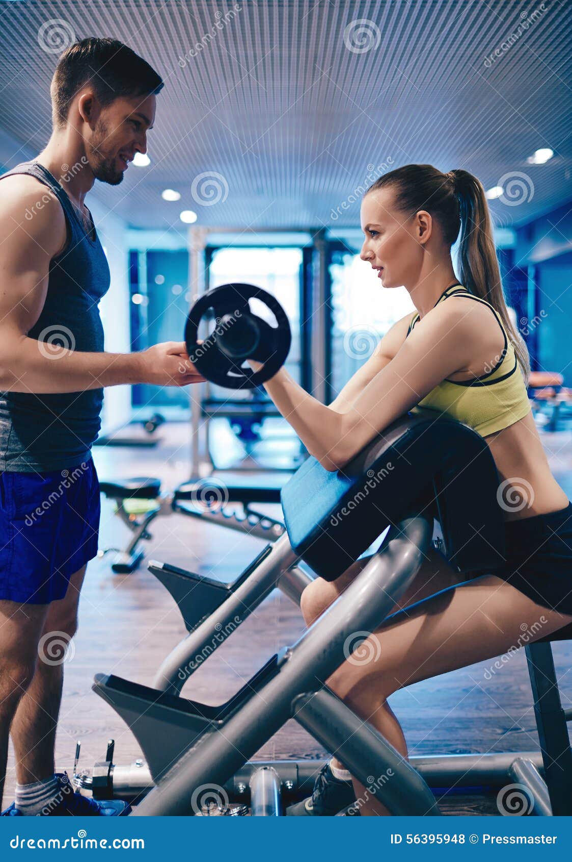 Trainer helping woman stock photo. Image of young, practicing - 56395948