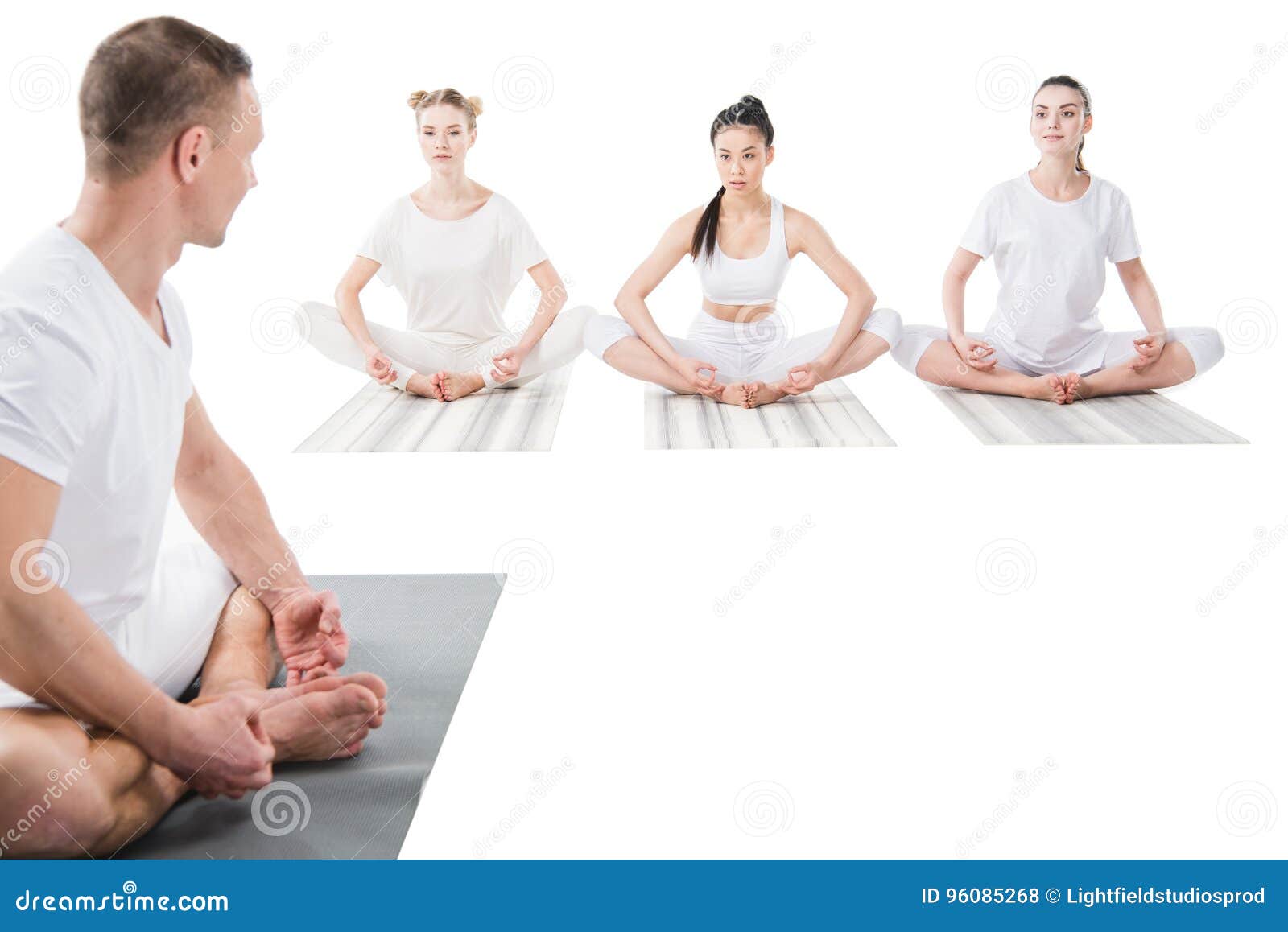 Trainer Helping Women Doing Yoga Pose Stock Photo - Image of ...