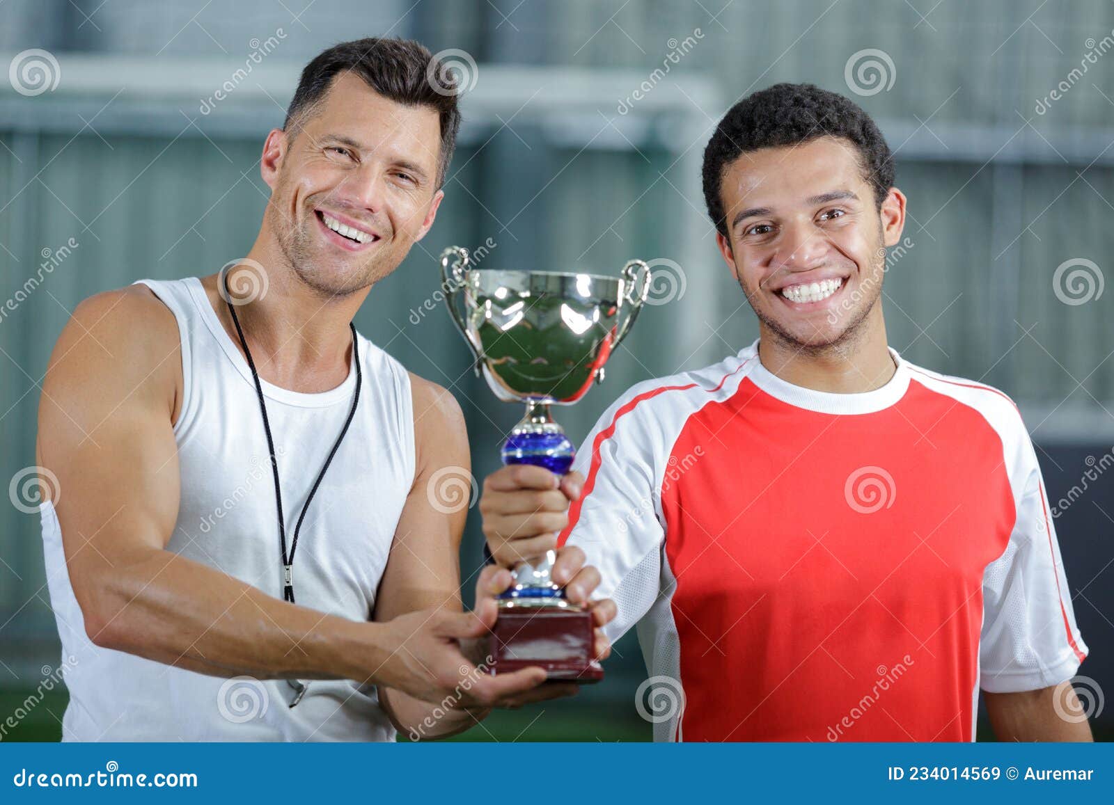 Trainer and Player Holding Trophy Stock Image - Image of successful ...