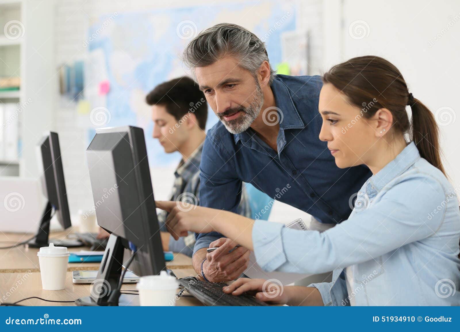 Trainer with Interns Working on Desktop Computer Stock Photo - Image of ...