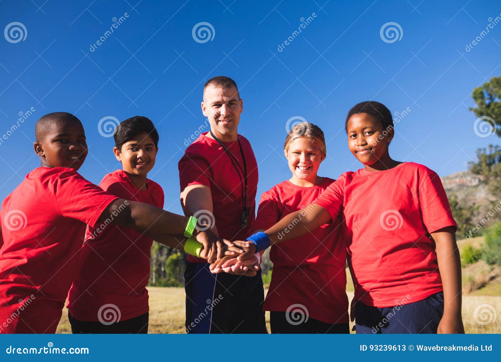 Trainer and Kids Forming Hand Stack in the Boot Camp Stock Image ...