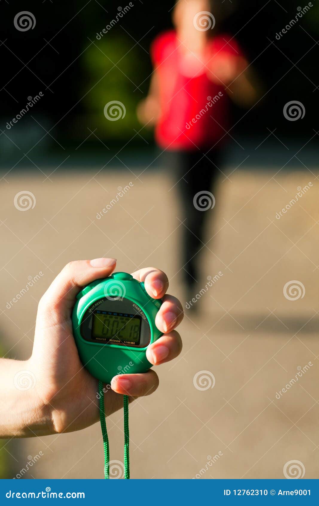 Trainer Measuring Time of Runner Stock Photo - Image of training ...