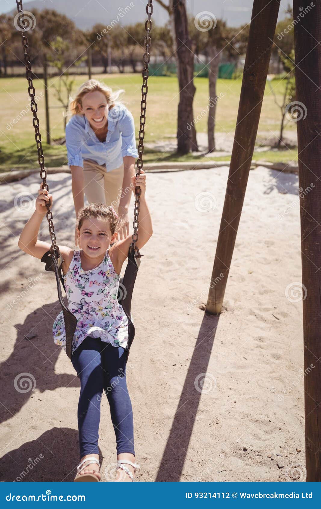 Boy Pushing Girl Sitting On Skateboard And Roll Stock Photography ...