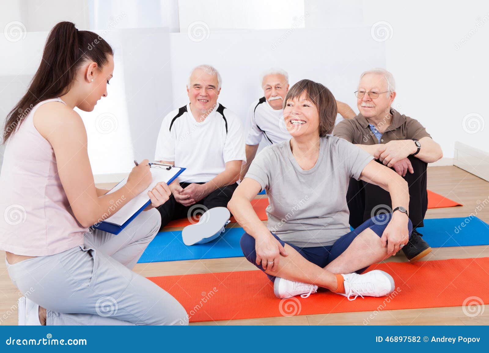 Trainer Taking Notes from Senior Customers Stock Photo - Image of five ...