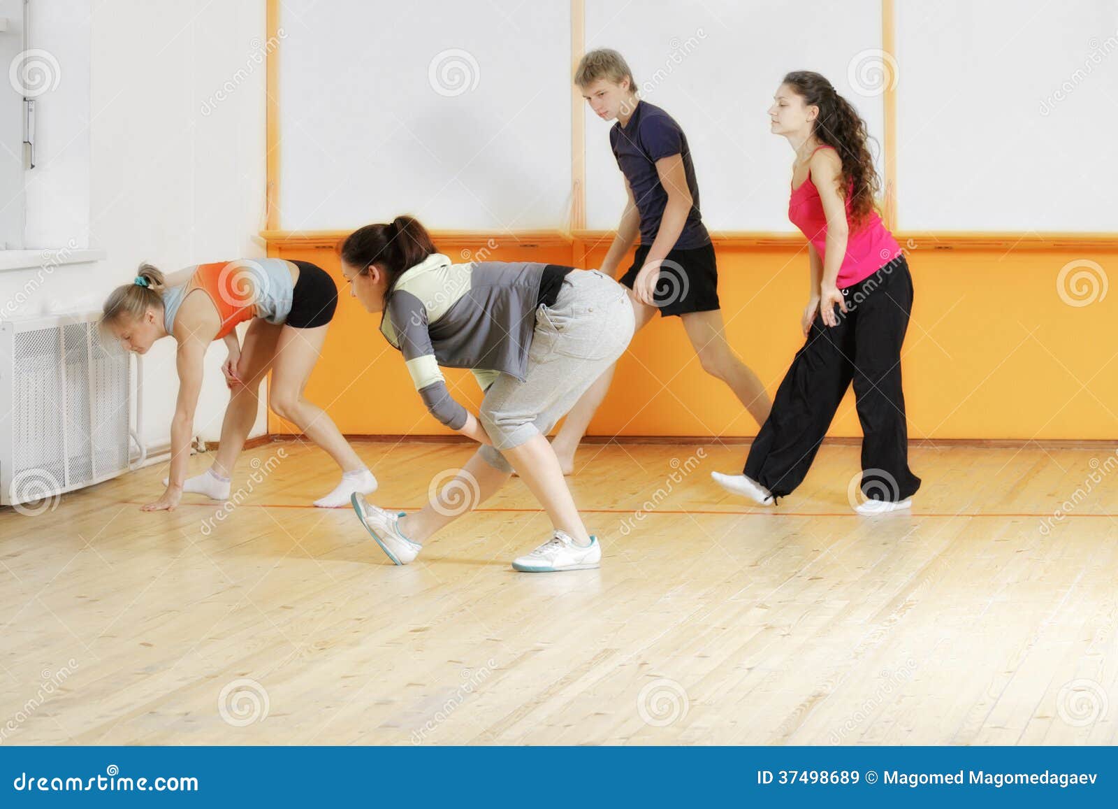 Trainer Teaching Group To Make Exercise Stock Image - Image of teaching ...