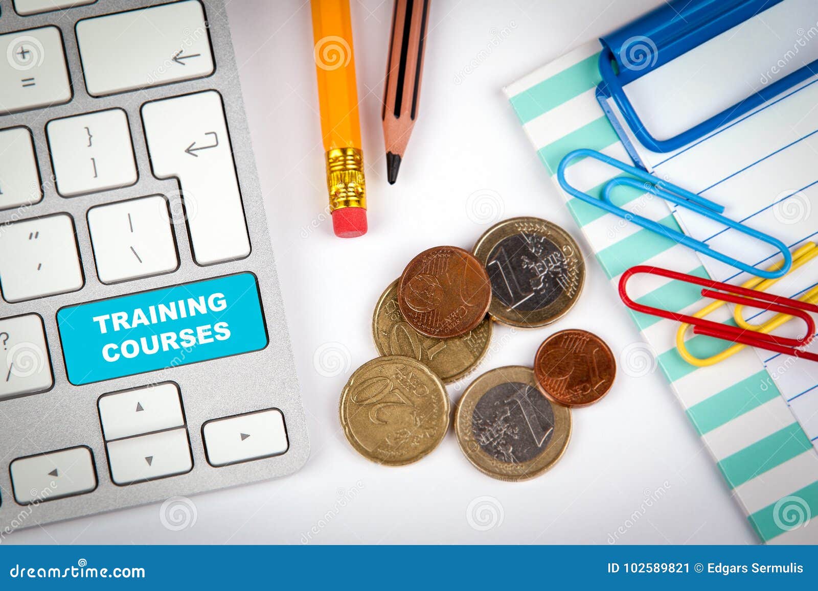 Training Courses Concept. Computer Keyboard on a White Office Desk with ...