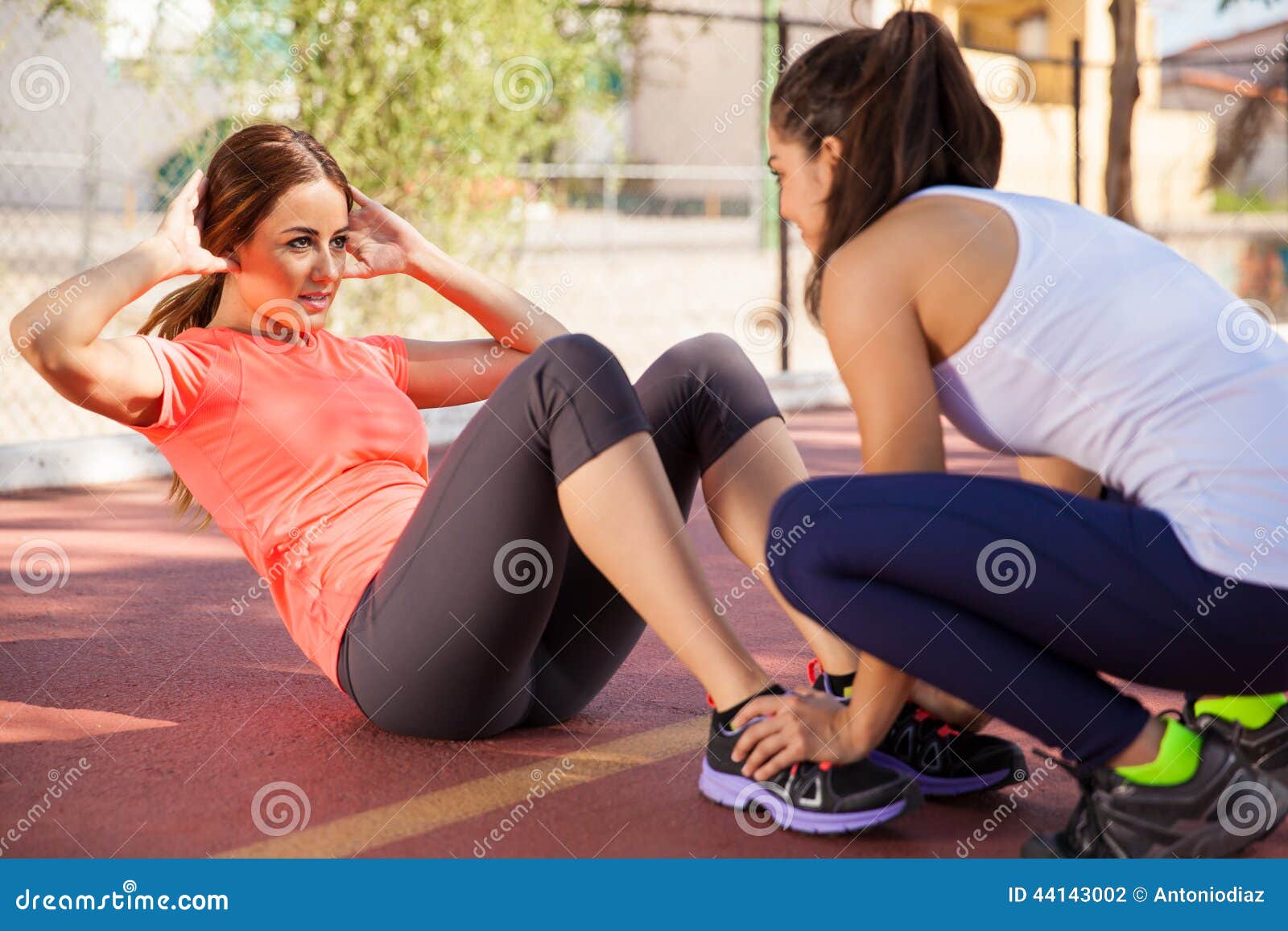 Training and Doing Crunches Stock Photo - Image of outfit, track: 44143002