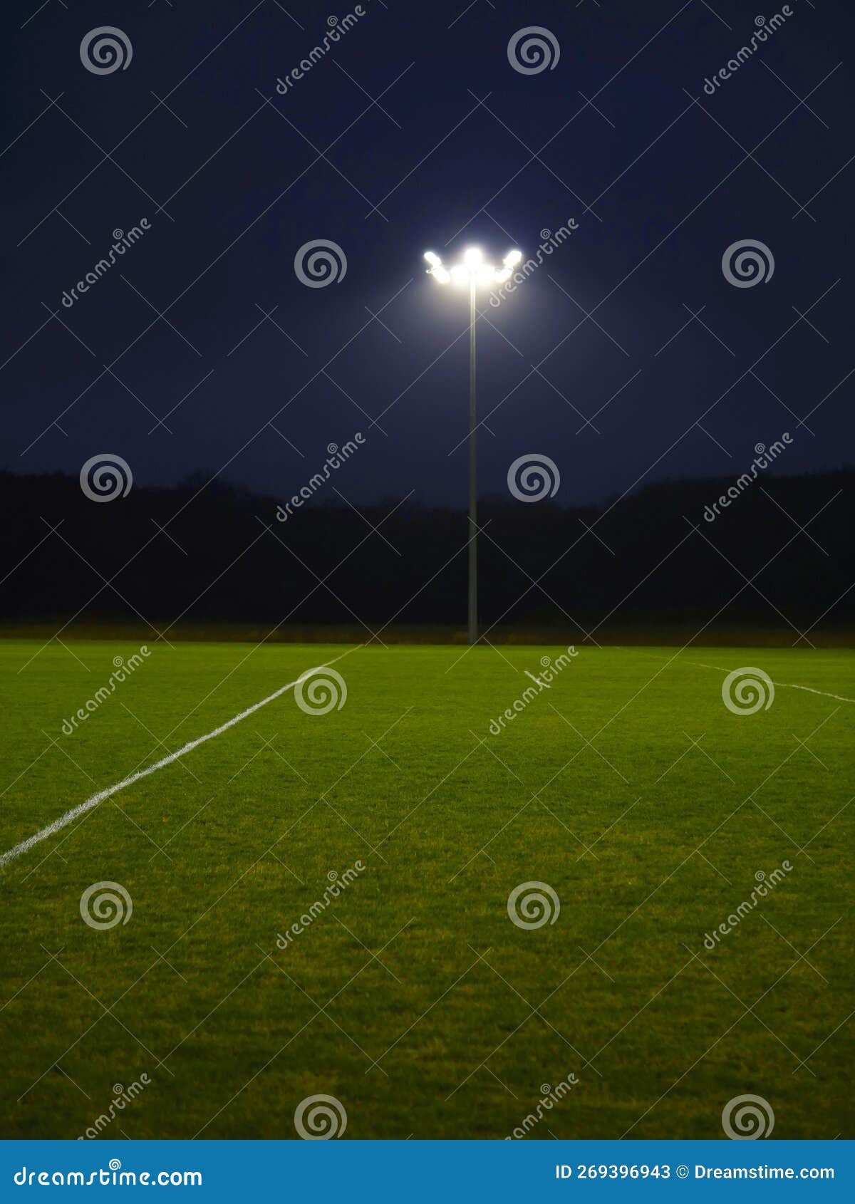 Training Ground with Grass Illuminated by Modern Powerful LED Lights ...