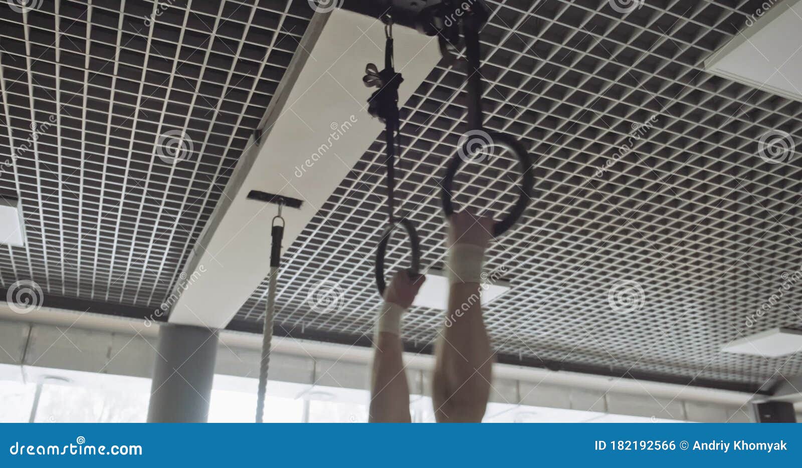 Training with Gymnastic Rings, Strength Exercise in Closed Gym. Men ...