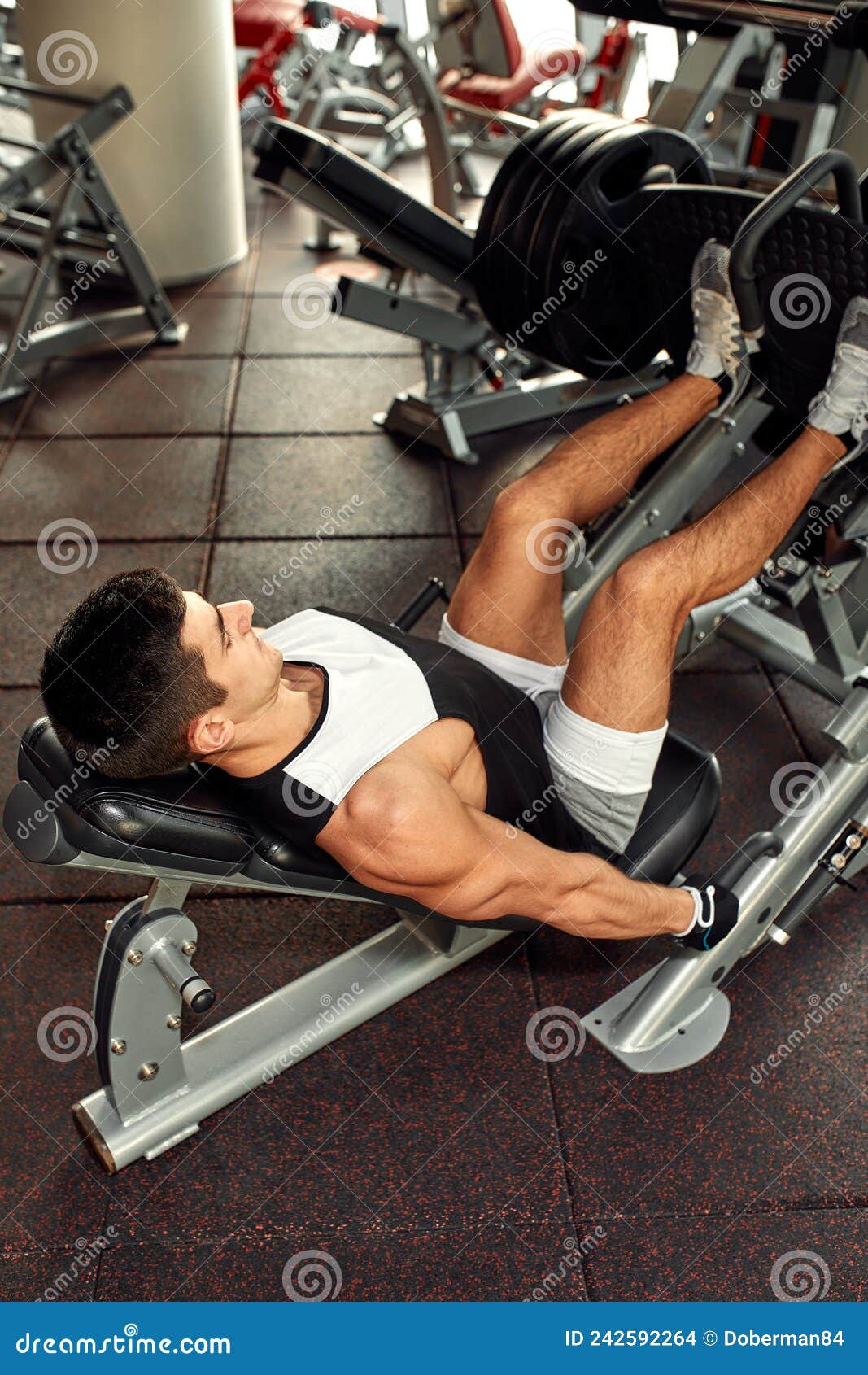 Training Legs in the Simulator, the Athlete Works with His Legs on the ...