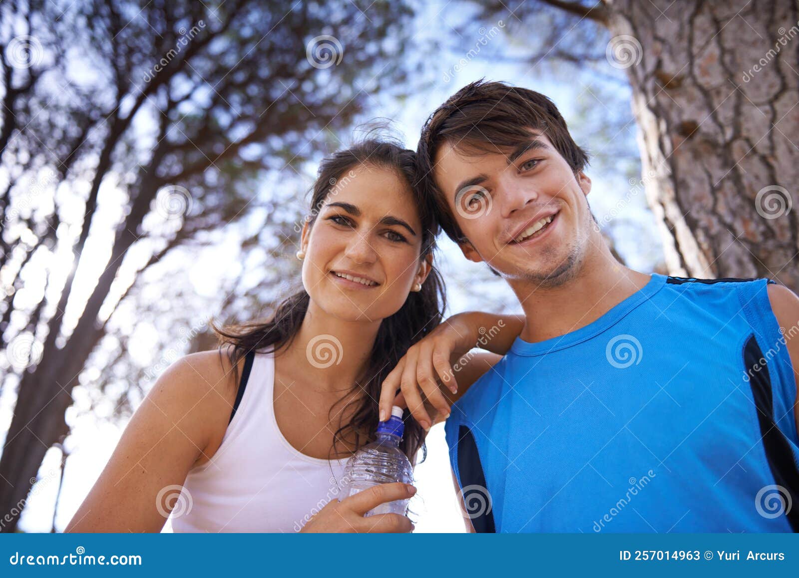 Training Together. Portrait of Young Runners Outdoors in the Woods ...